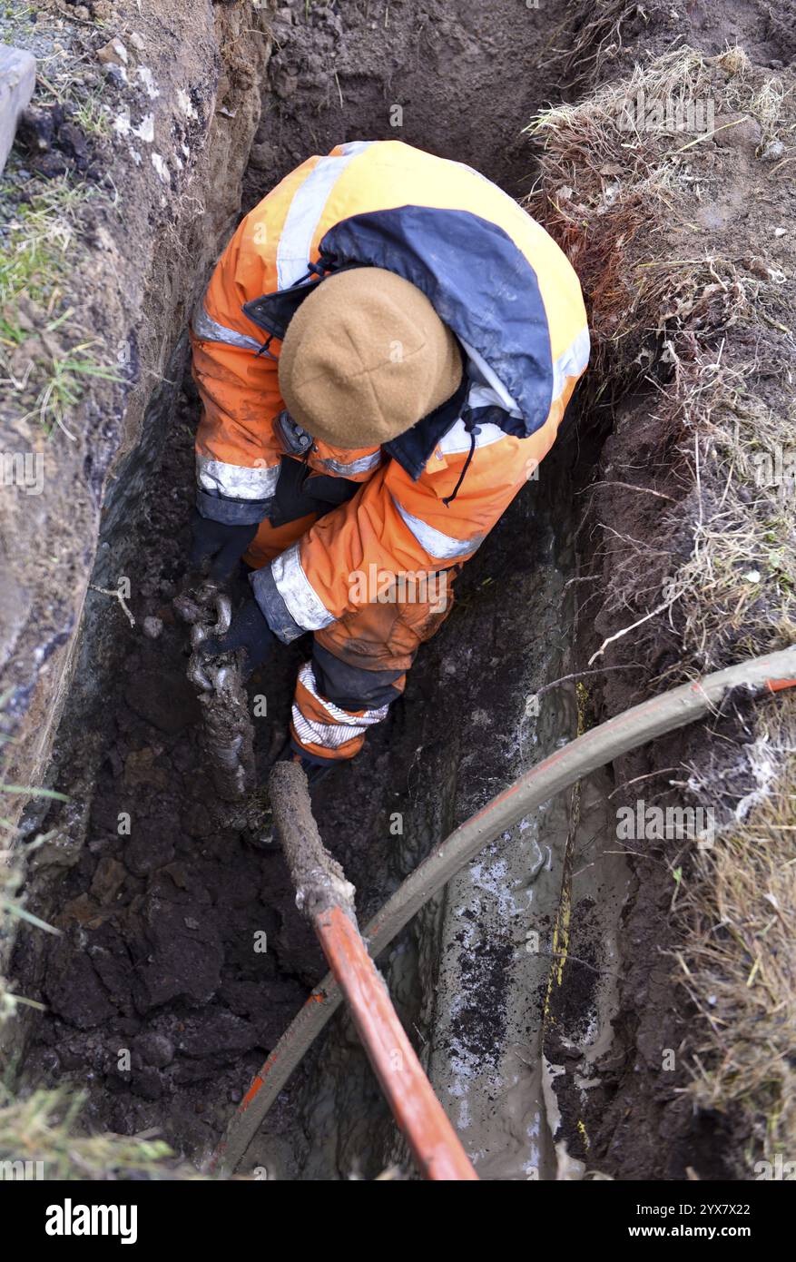 Technician connects drill head and fibre optic cable Stock Photo - Alamy