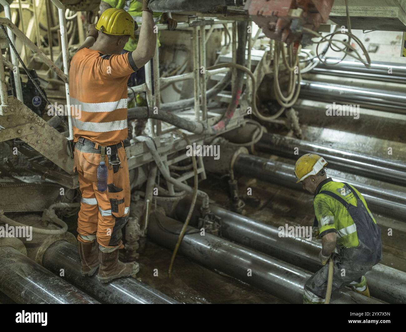 Workers on the Wilma double-shield tunnel boring machine, construction ...