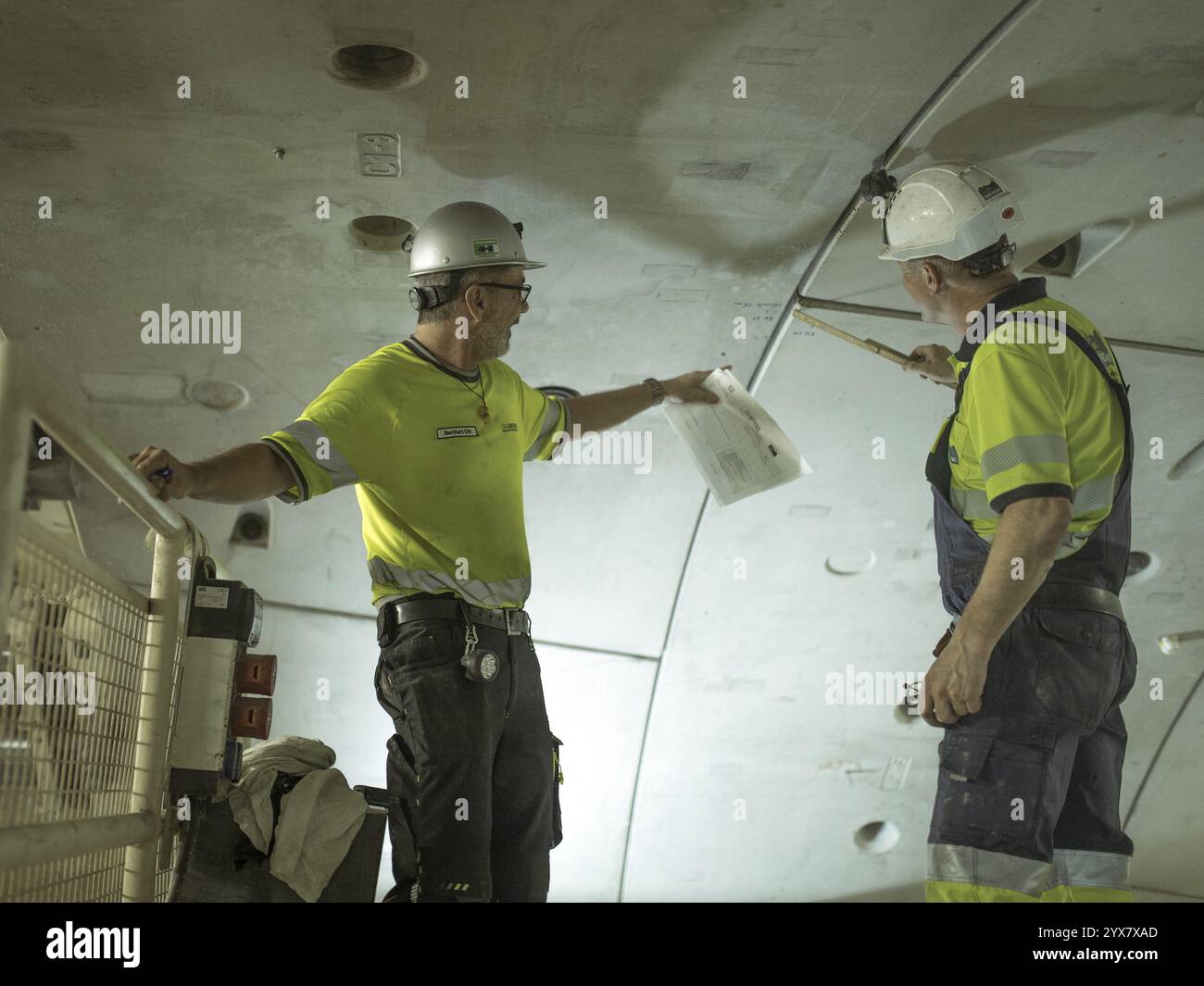 Workers on the Wilma double-shield tunnel boring machine, construction ...