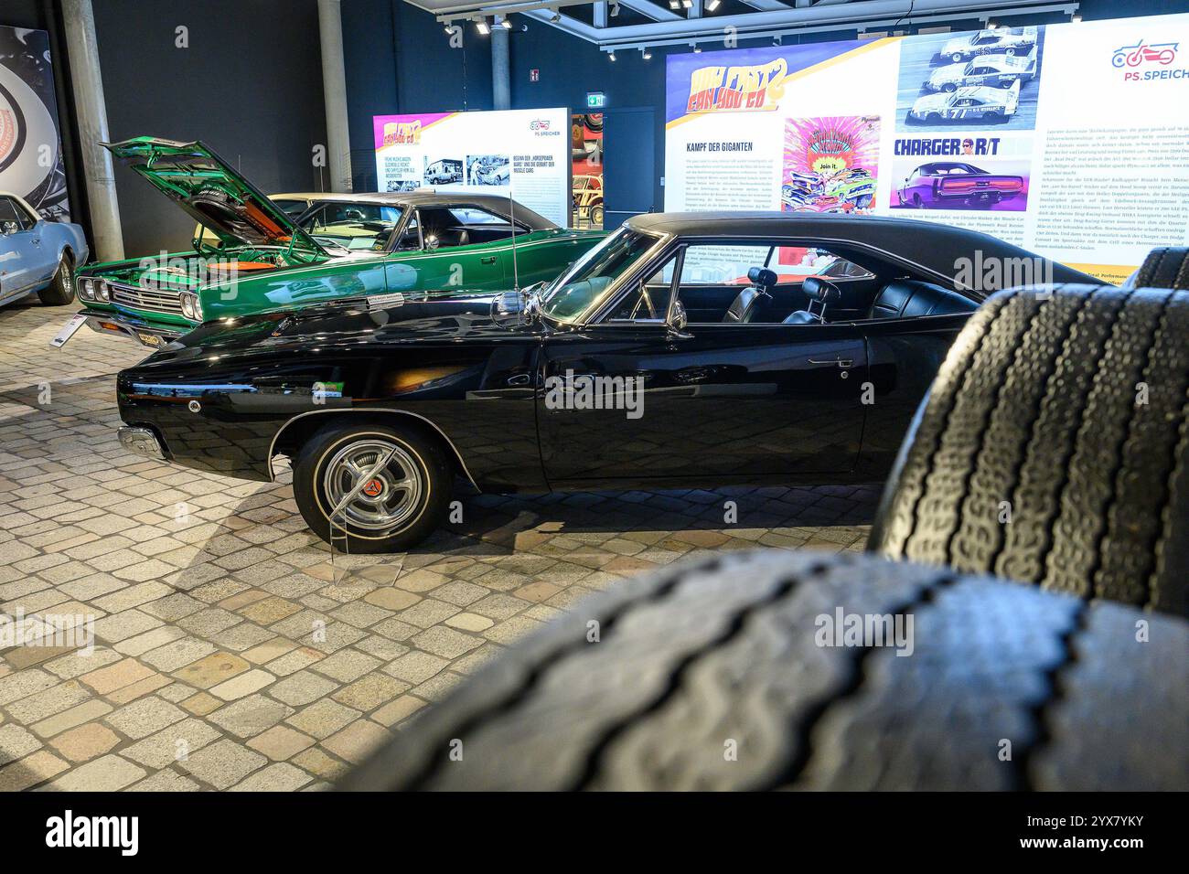 Einbeck, Germany. 14th Dec, 2024. A Dodge Charger R/T (r) and Plymouth ...