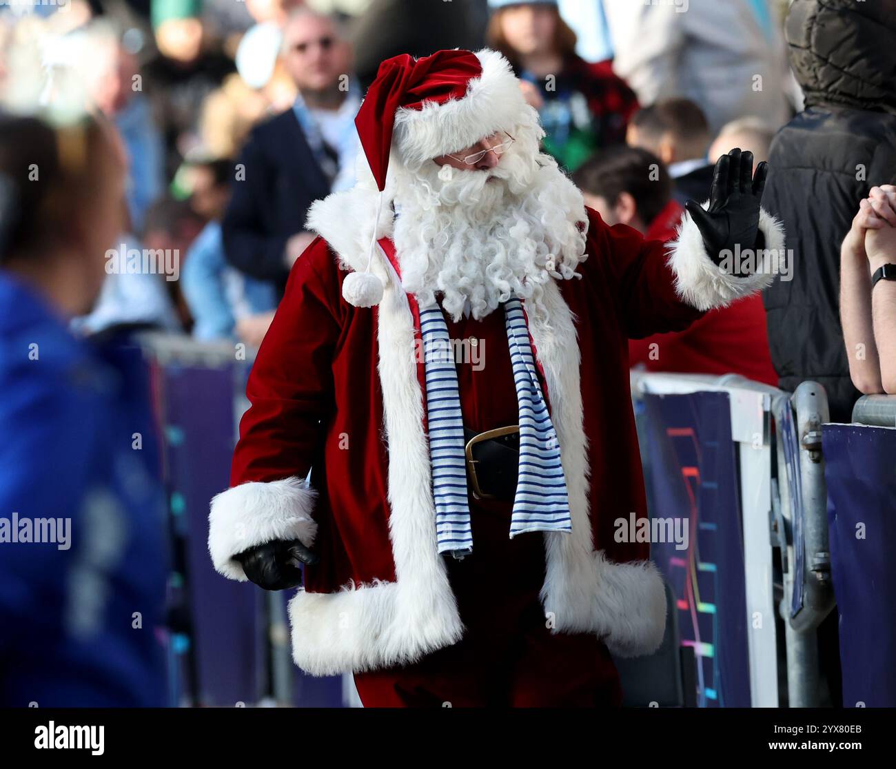 A Santa Claus waves to fans in the stand during the Sky Bet ...