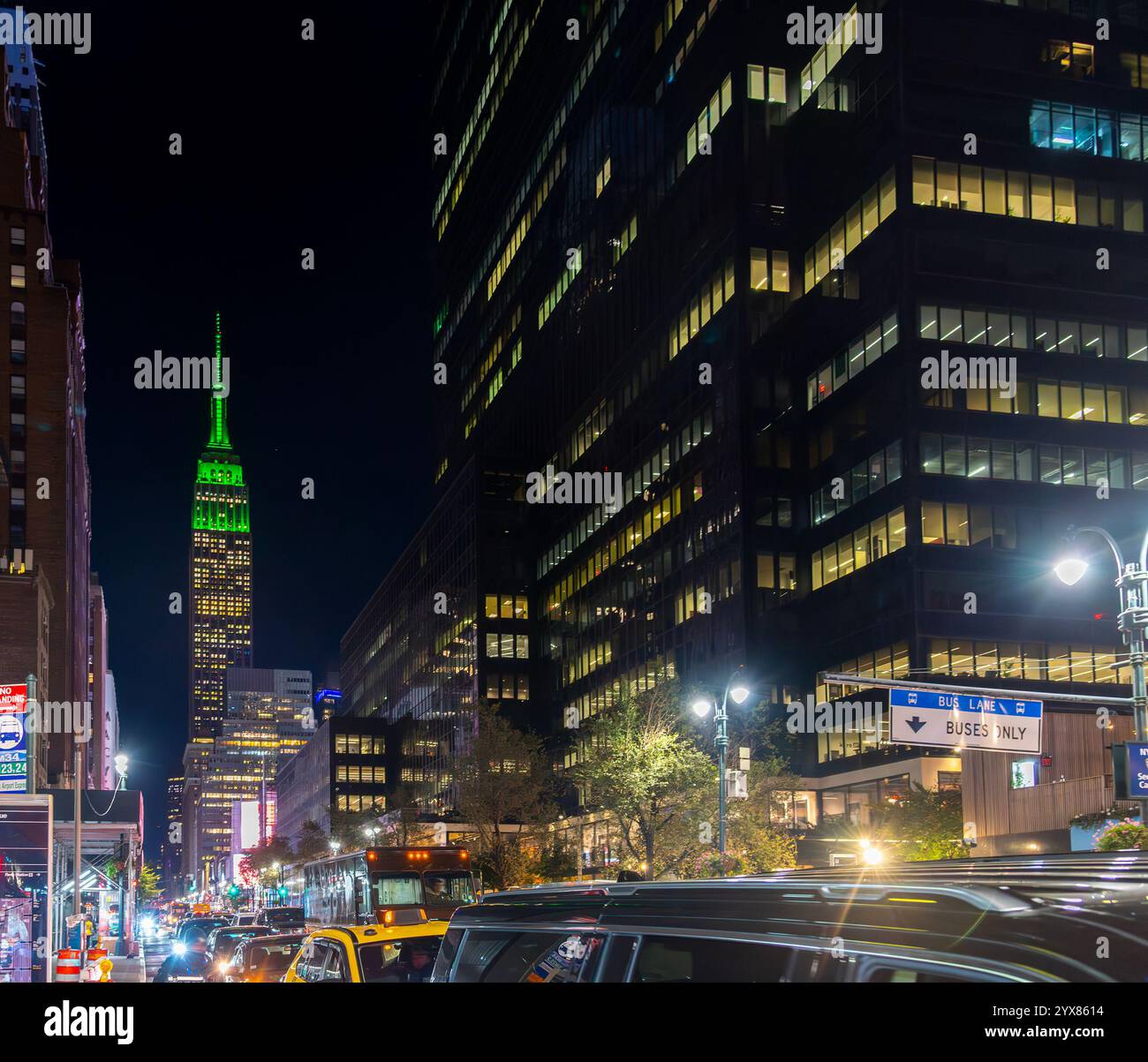 Midtown Manhattan by night with the Empire State Building on the ...
