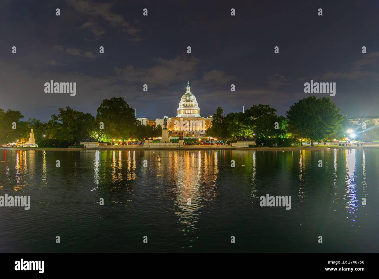 United States Capitol Building by the Capitol Reflecting Pool at night ...