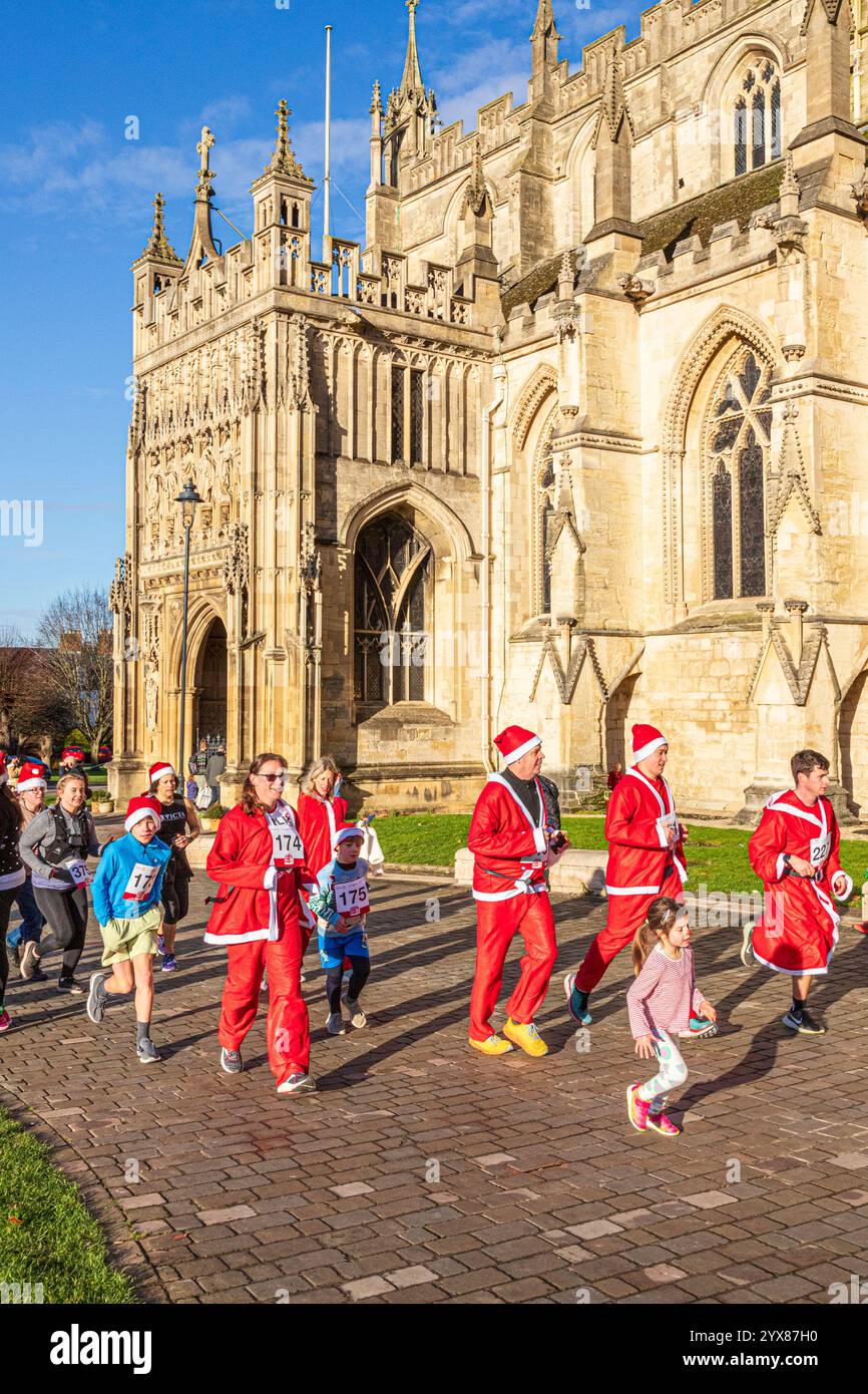 Some of the 600+ Santas passing the Cathedral while running the Santa ...