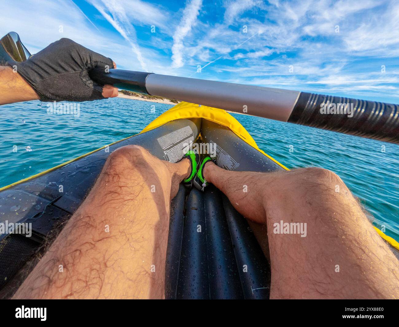 First person view of a man kayaking in the blue sea Stock Photo - Alamy