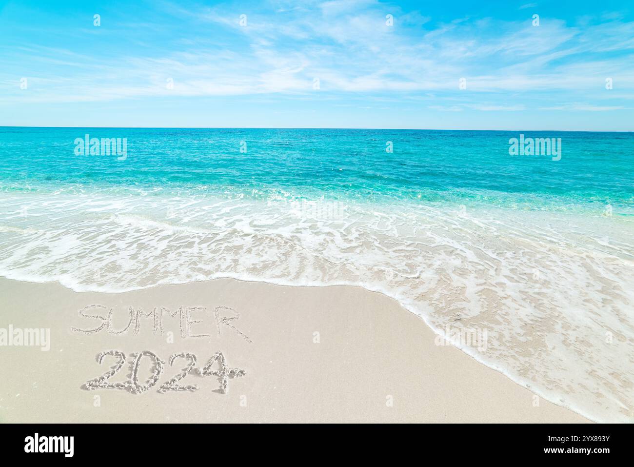 2024 written on a beach in sand hi-res stock photography and images - Alamy