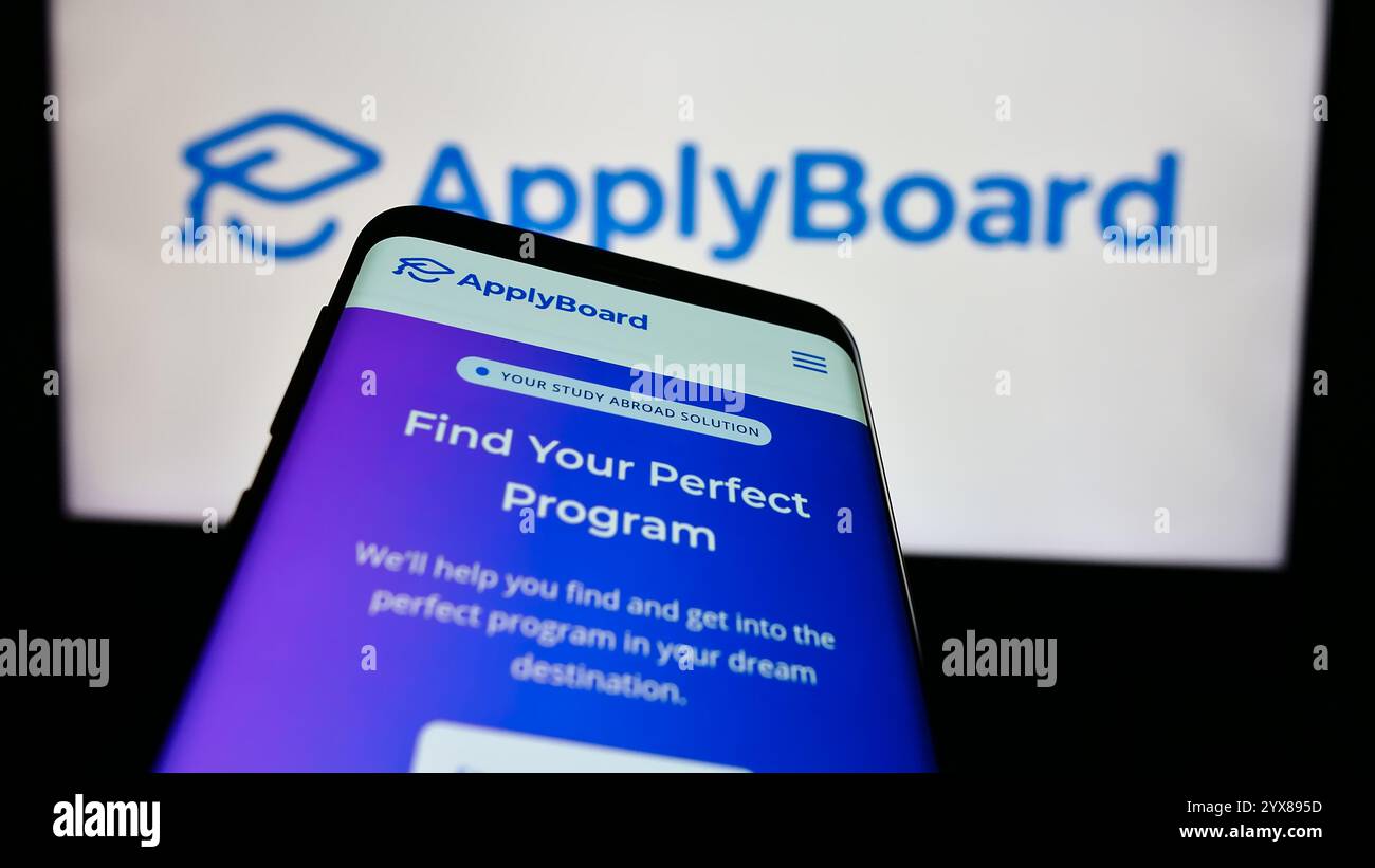 In this photo illustration, a mobile phone with the website of Canadian ...