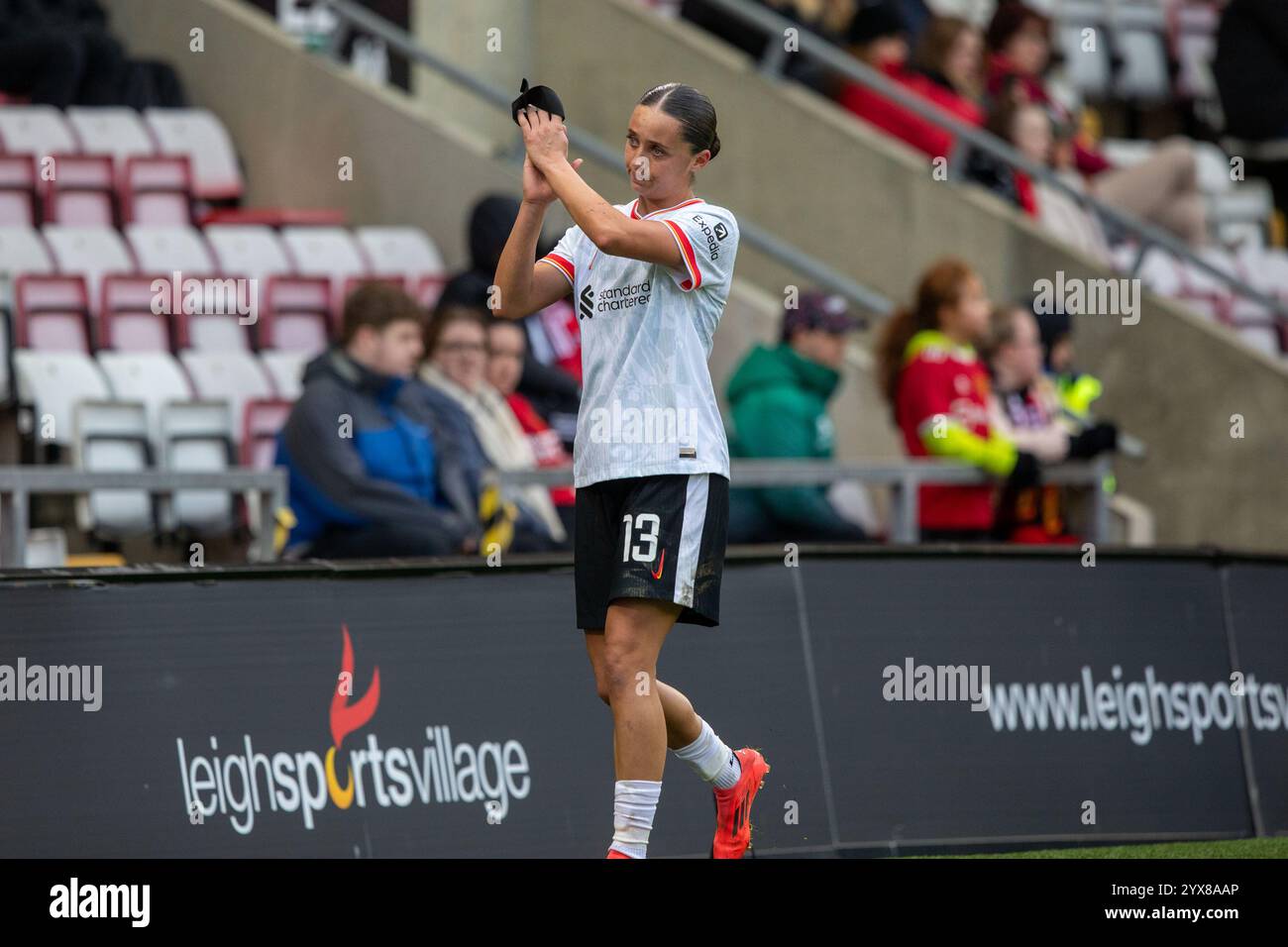 Leigh, England, 8th December 2024 Mia Enderby (13 Liverpool) claps the ...