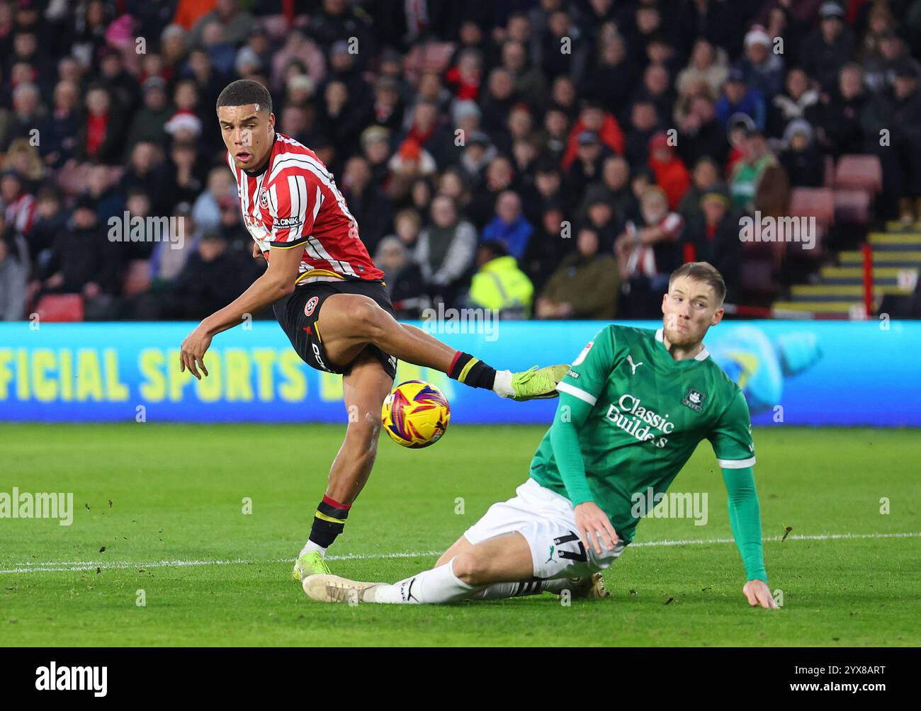 Sheffield, UK. 14th Dec, 2024. Ryan One of Sheffield United with Lewis ...