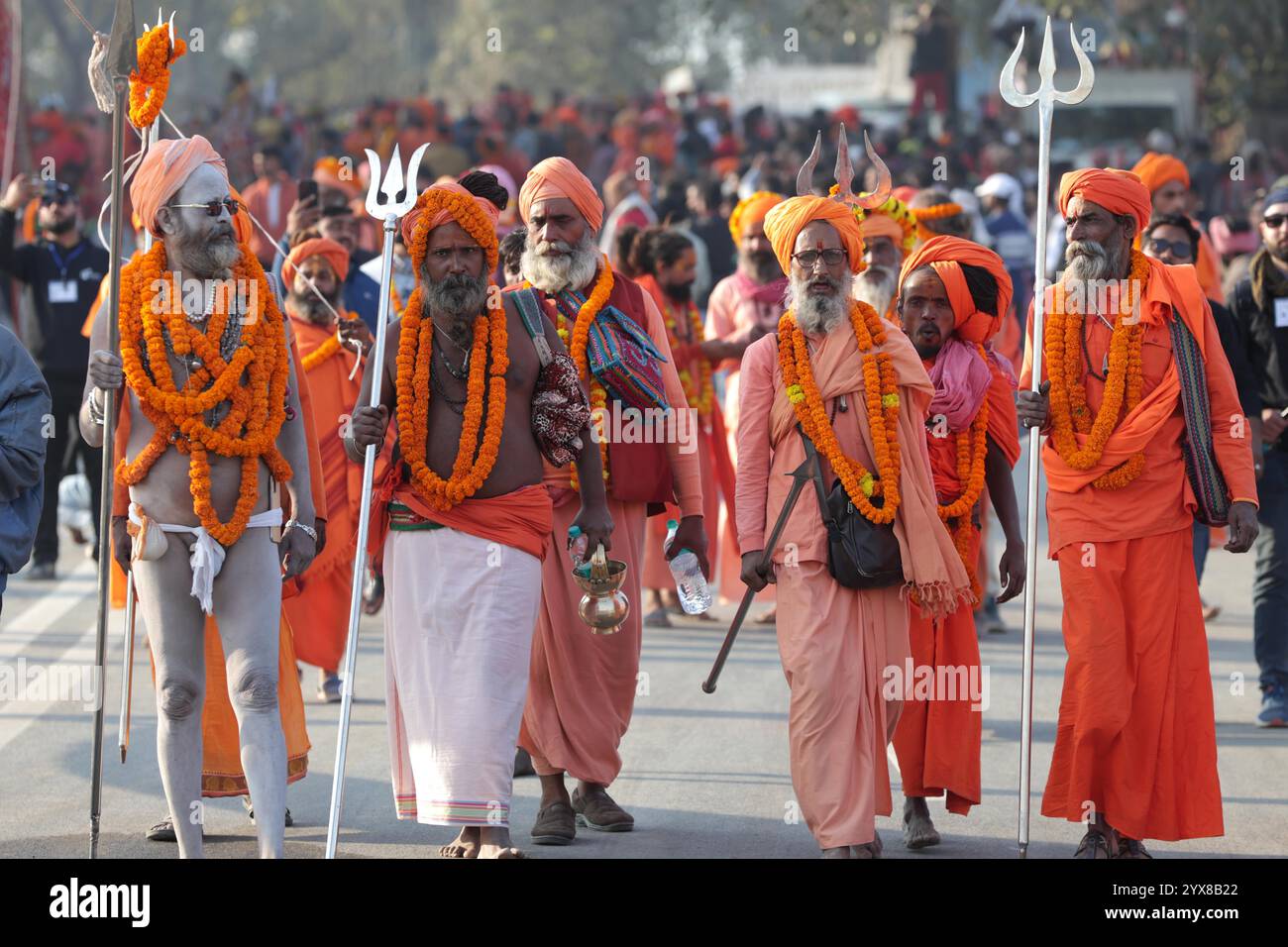 Prayagraj, India. 14 Dec 2024, Naga sadhus take part in a procession ...
