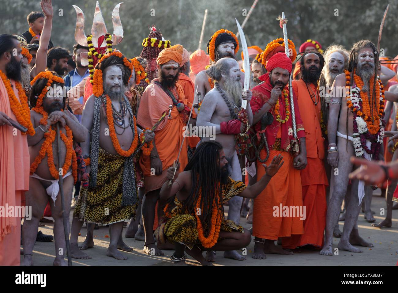 Prayagraj, India. 14 Dec 2024 Naga sadhus take part in a procession ...