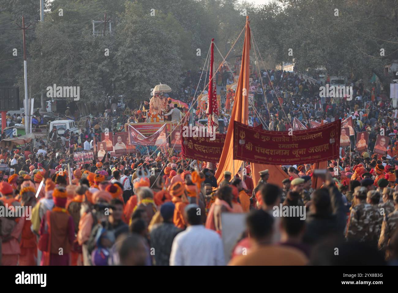 Prayagraj, India. 14 Dec 2024, Naga sadhus take part in a procession ...