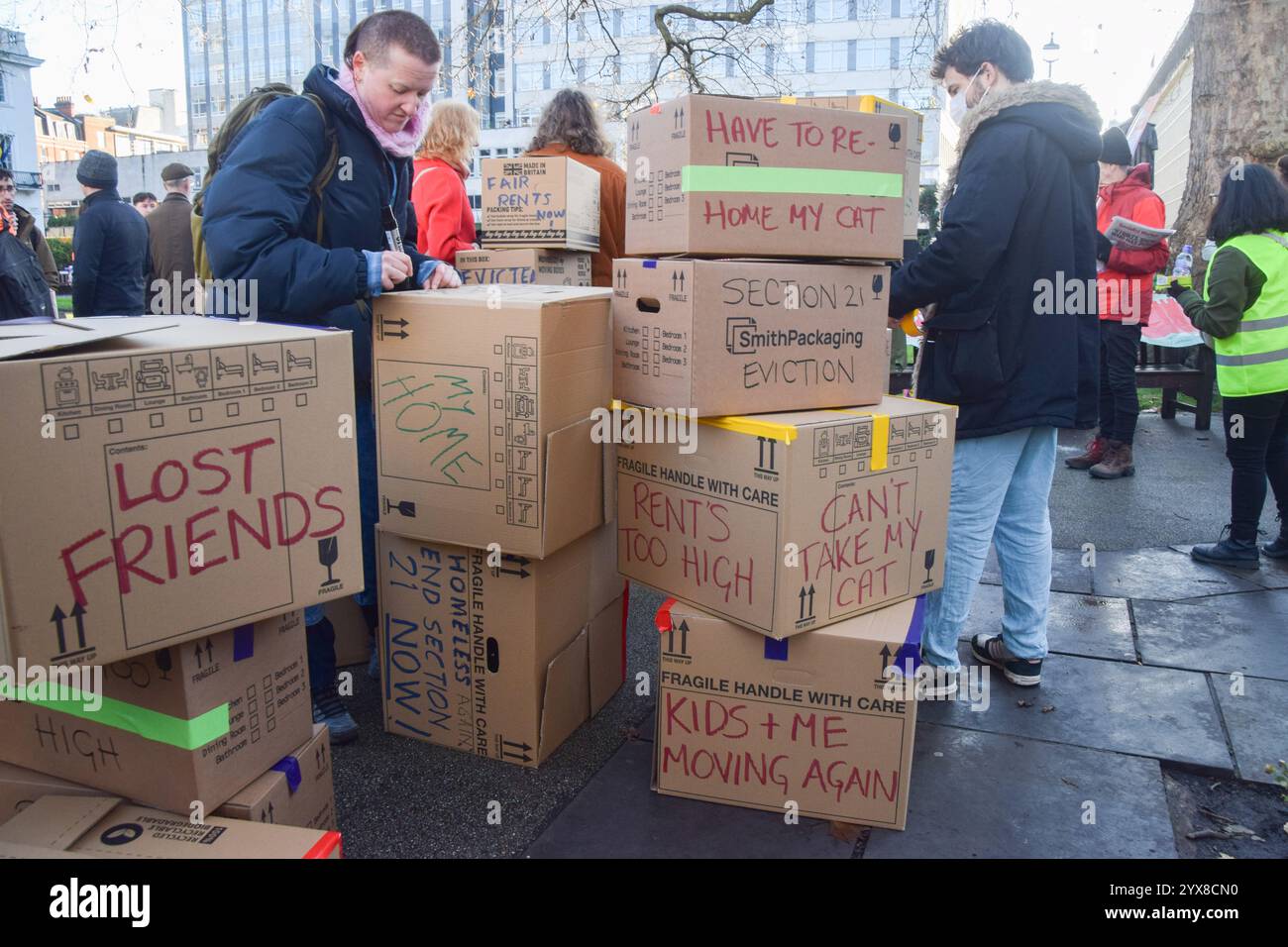 December 14, 2024, London, England, UK: Protesters mark boxes with ...