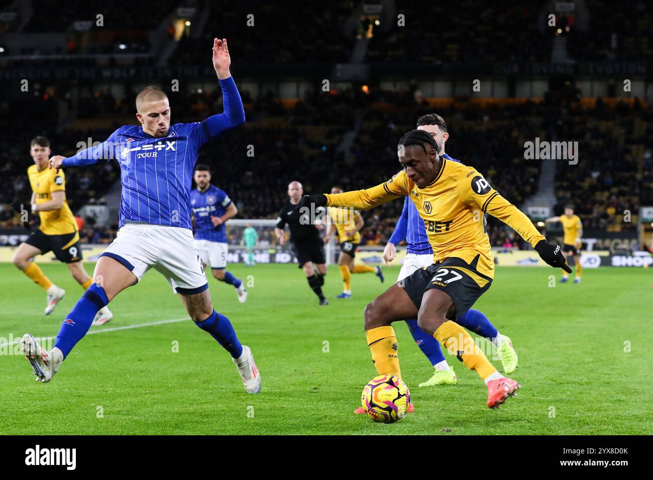 Jean-Ricner Bellegarde of Wolverhampton Wanderers crosses the ball ...