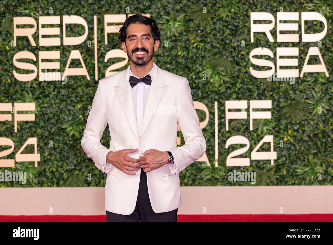 Dev Patel poses for photographers for the Closing Ceremony red carpet during the Red Sea ...