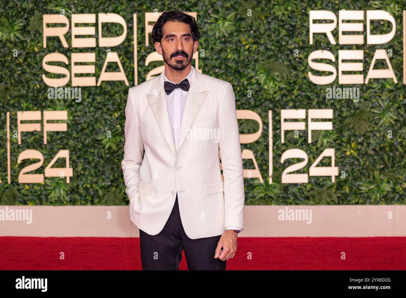 Dev Patel poses for photographers for the Closing Ceremony red carpet during the Red Sea ...