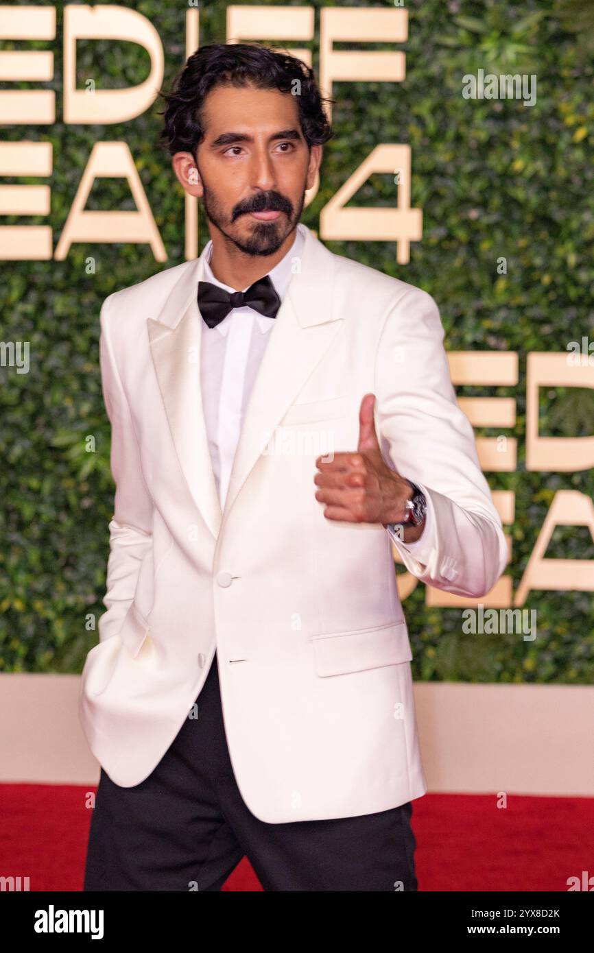 Dev Patel poses for photographers for the Closing Ceremony red carpet during the Red Sea ...