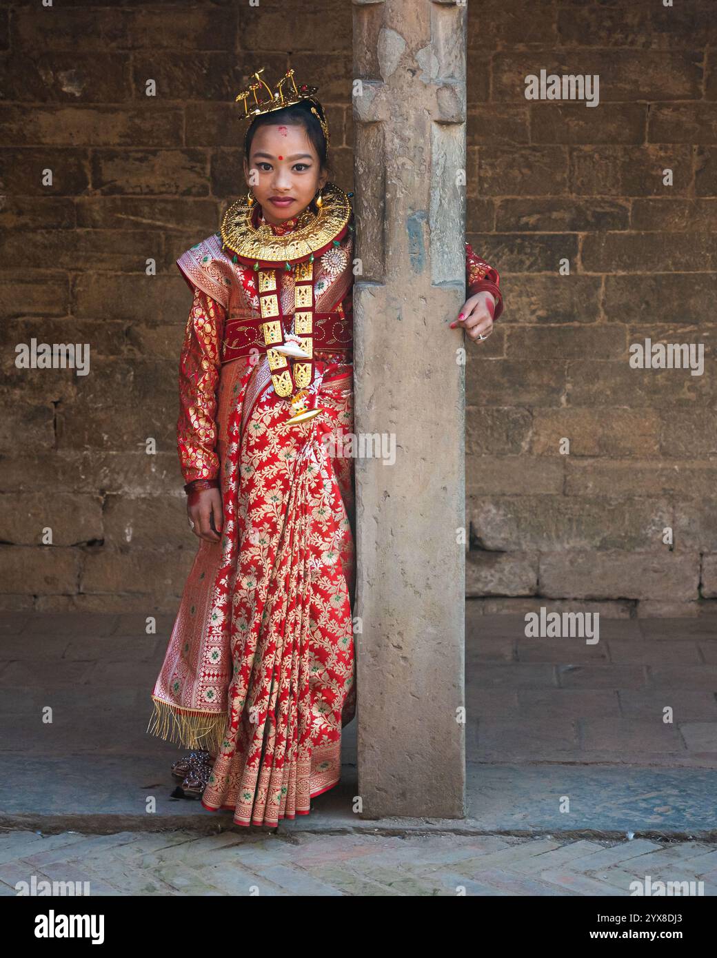 A little girl wears traditional Newar wedding attire in Bhaktapur ...