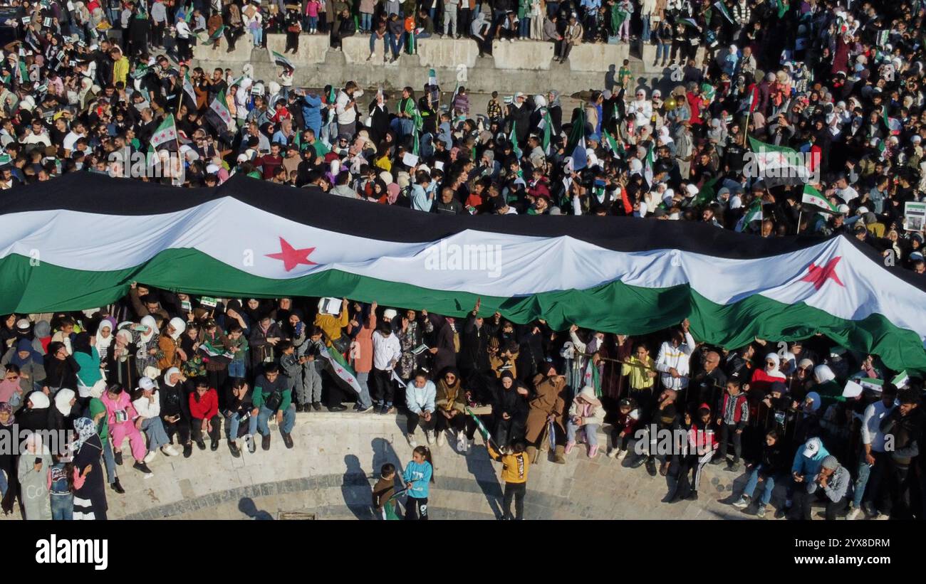 People celebrate in Latakia, Syria after the fall of Syria's Bashar ...
