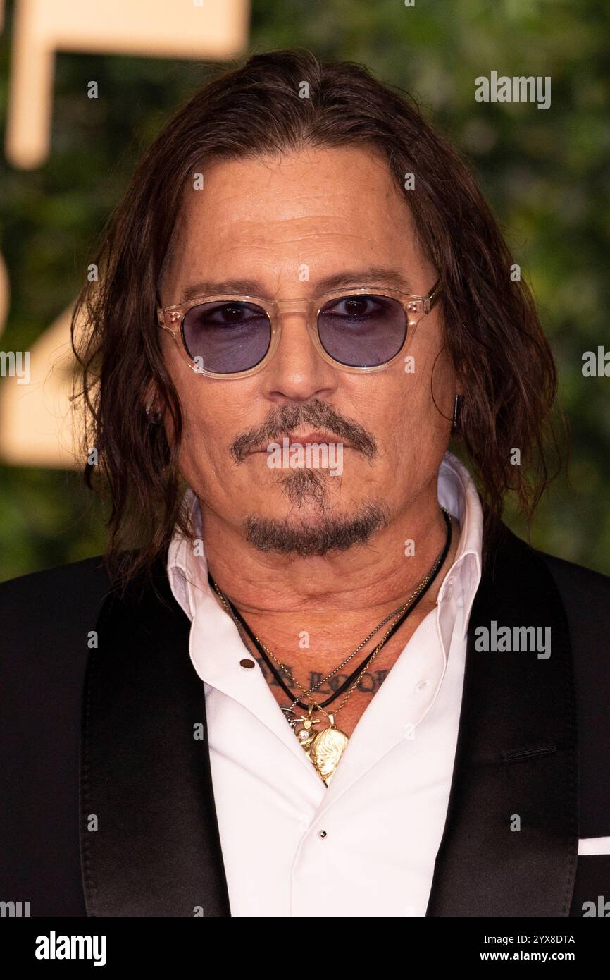 Johnny Depp poses for photographers for the Closing Ceremony red carpet ...