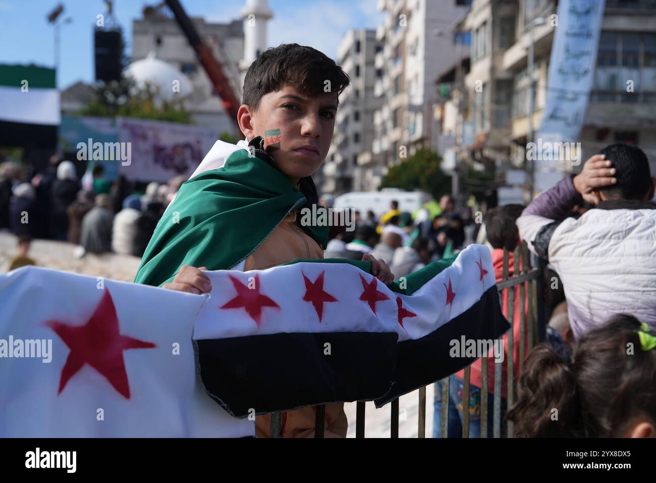 People celebrate in Latakia, Syria after the fall of Syria's Bashar ...