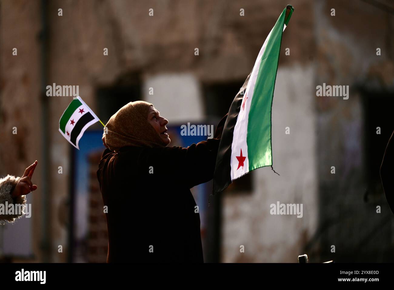 People celebrate in Latakia, Syria after the fall of Syria's Bashar ...