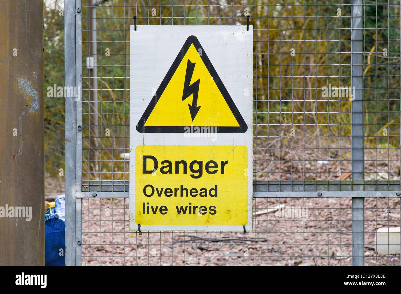 Danger overhead live wires warning sign Stock Photo - Alamy