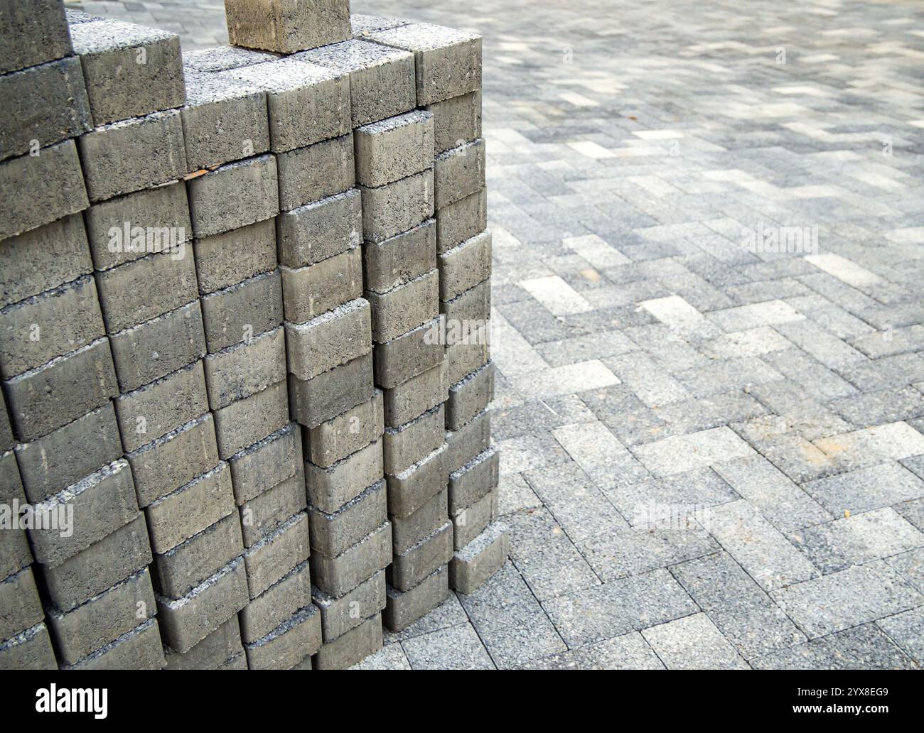 Paving stones are stacked on a newly paved area Stock Photo - Alamy