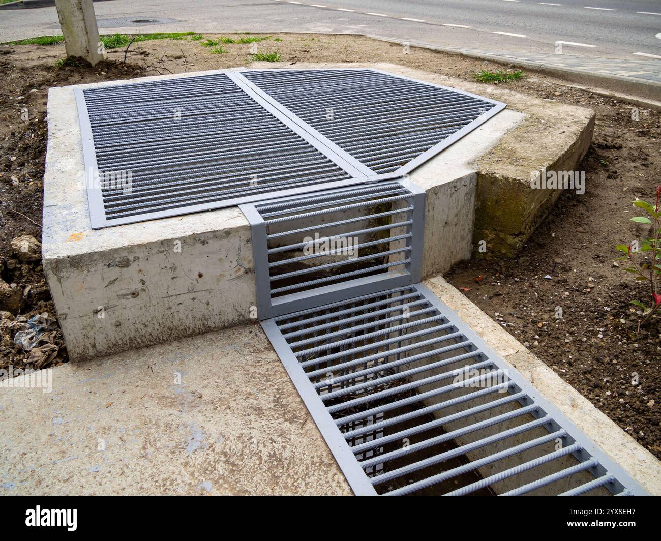 Drainage collector with a channel extending from it Stock Photo - Alamy