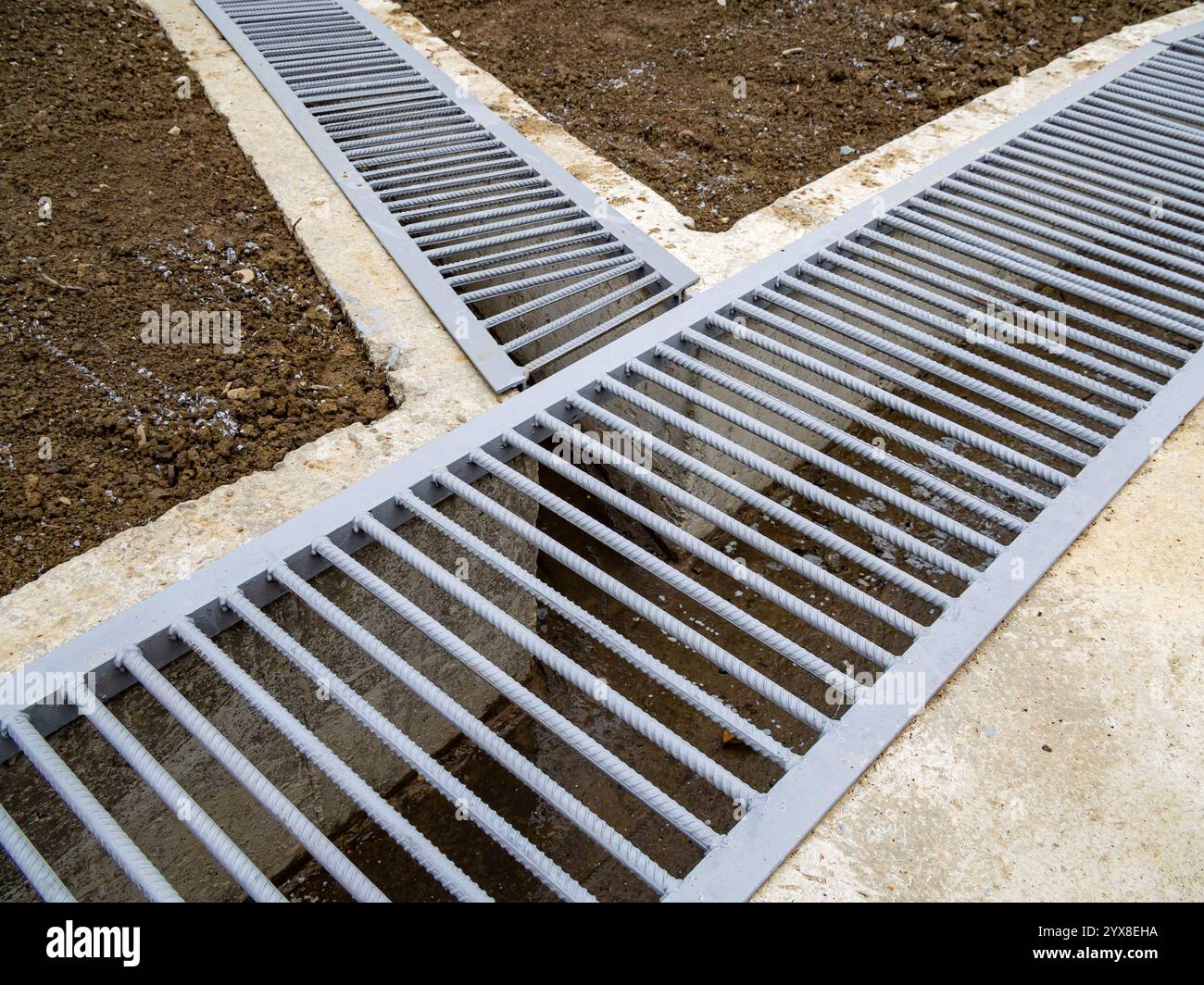 Drainage system grate made of metal angle and reinforcement Stock Photo ...