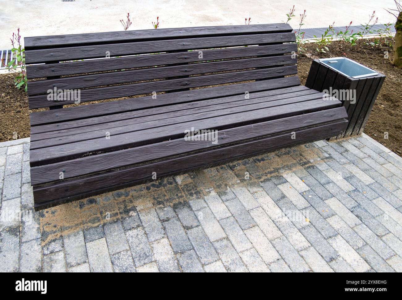 Modern plastic bench made from recycled materials Stock Photo - Alamy