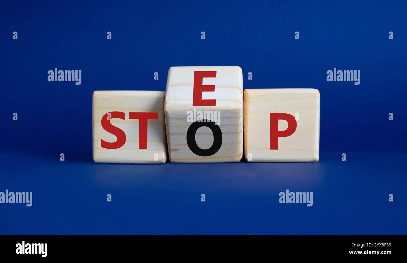 Step vs Stop symbol. Wooden cubes with words Stop and Step. Beautiful ...
