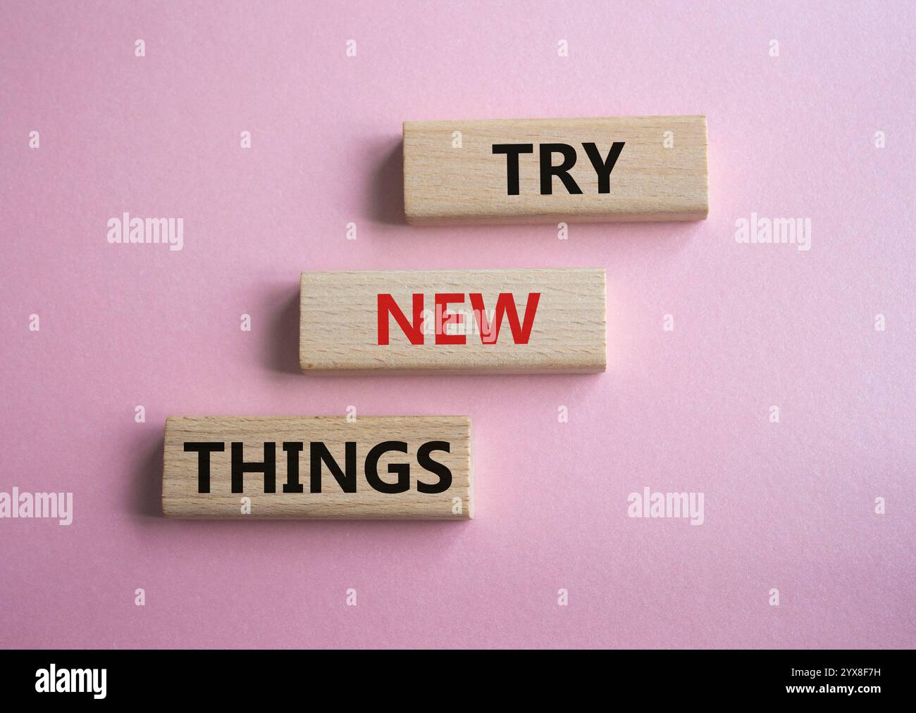 Try new Things symbol. Concept words Try new Things on wooden blocks ...
