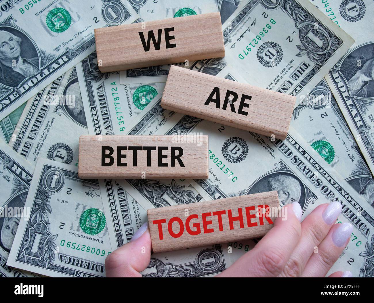We are better together symbol. Wooden blocks with words We are better ...