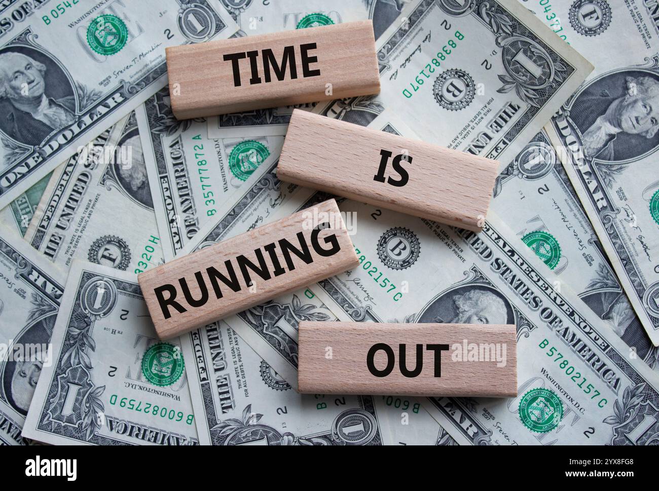 Time is running out symbol. Concept words Time is running out on wooden ...