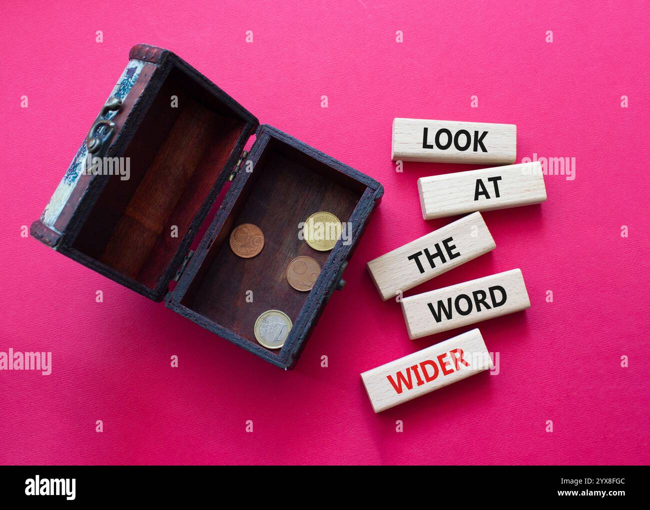 Look at the world wider symbol. Wooden blocks with words Look at the ...