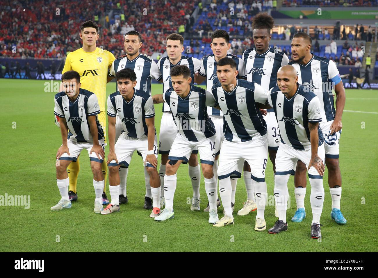 Pachuca's starting players pose for a team photo prior to the Intercontinental Cup soccer match ...