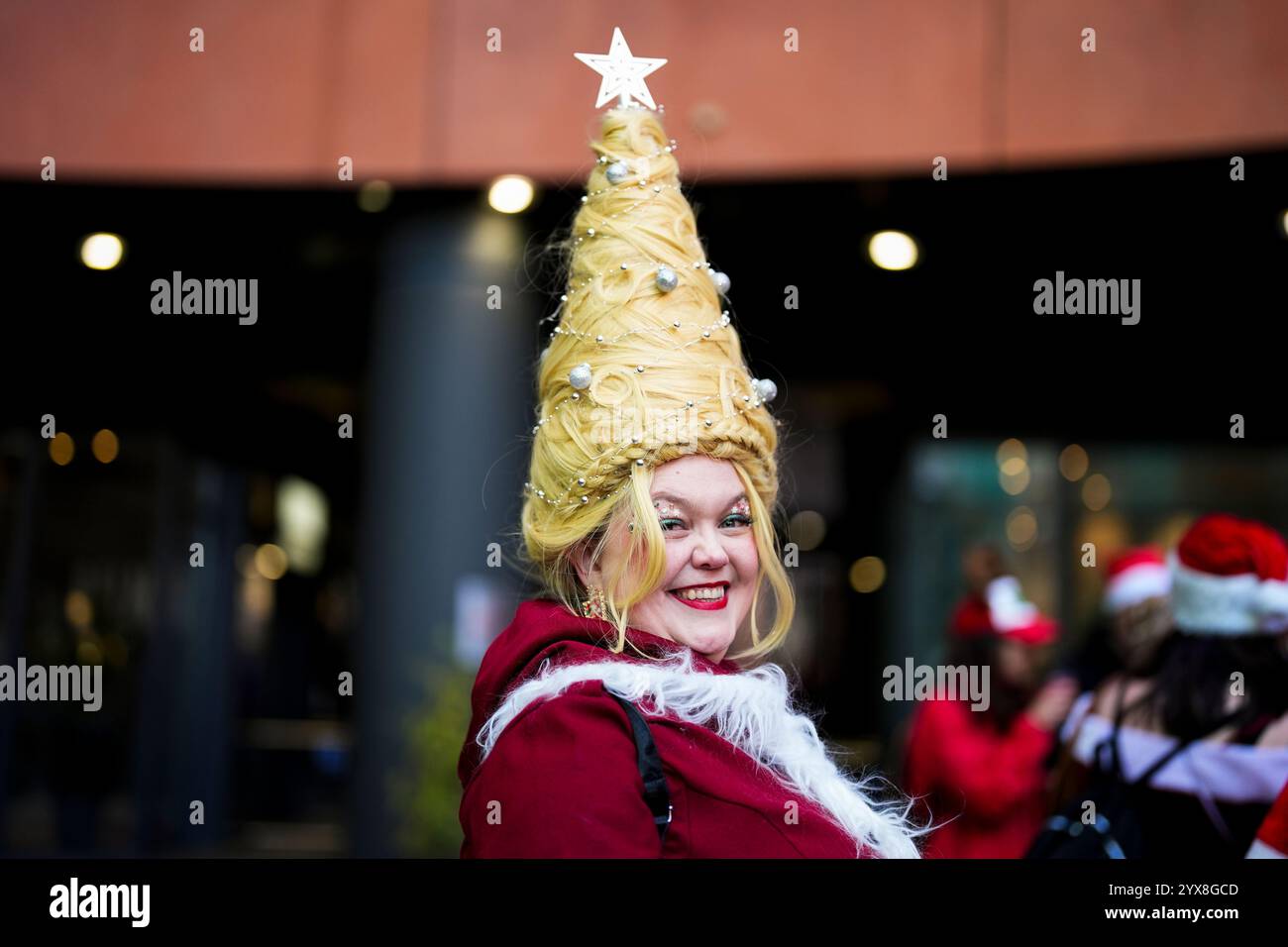 People dressed as Santa take part in the London Santacon Christmas ...