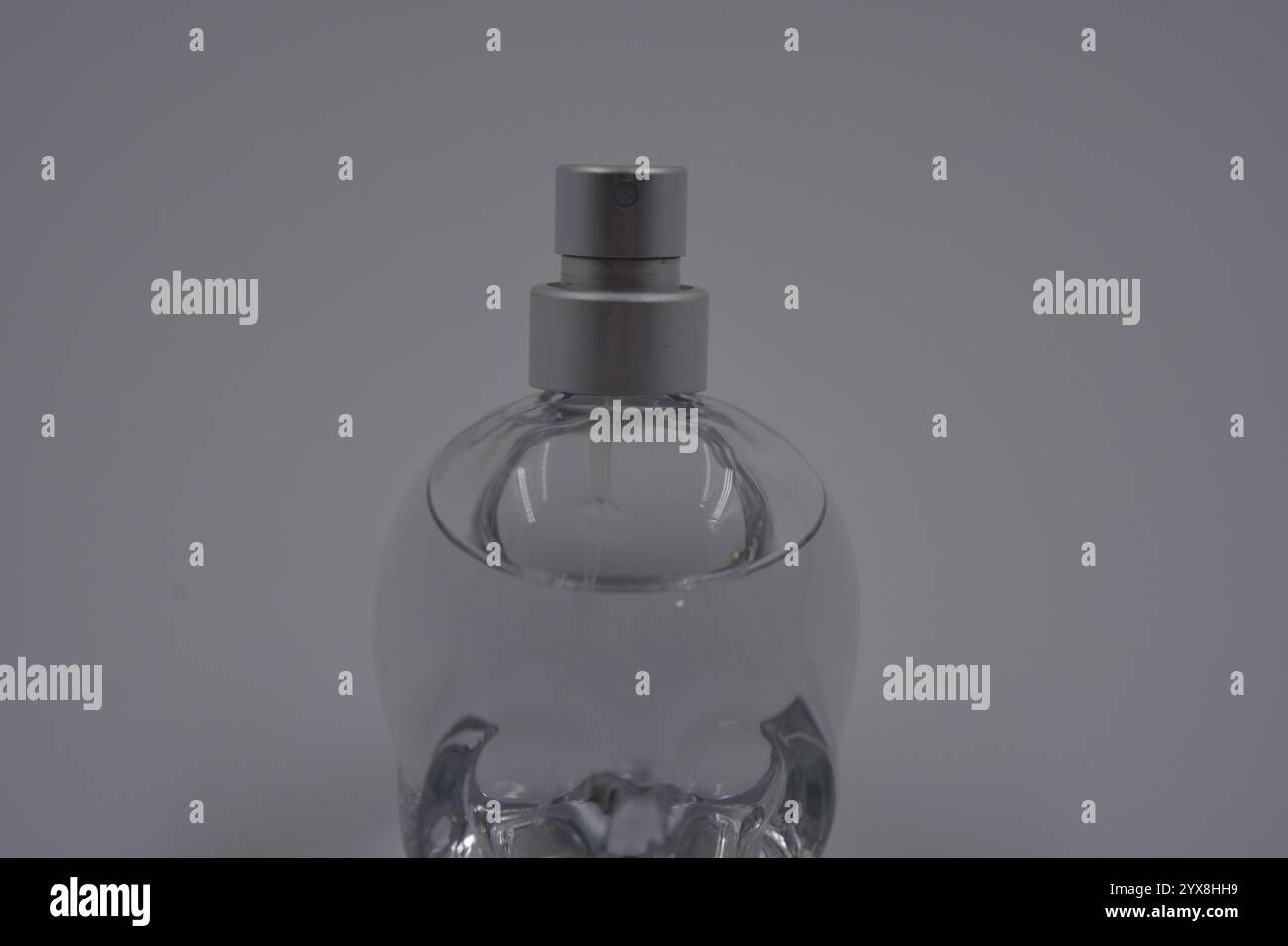 Objects, things, cosmetics and perfumes. A beautiful transparent glass ...