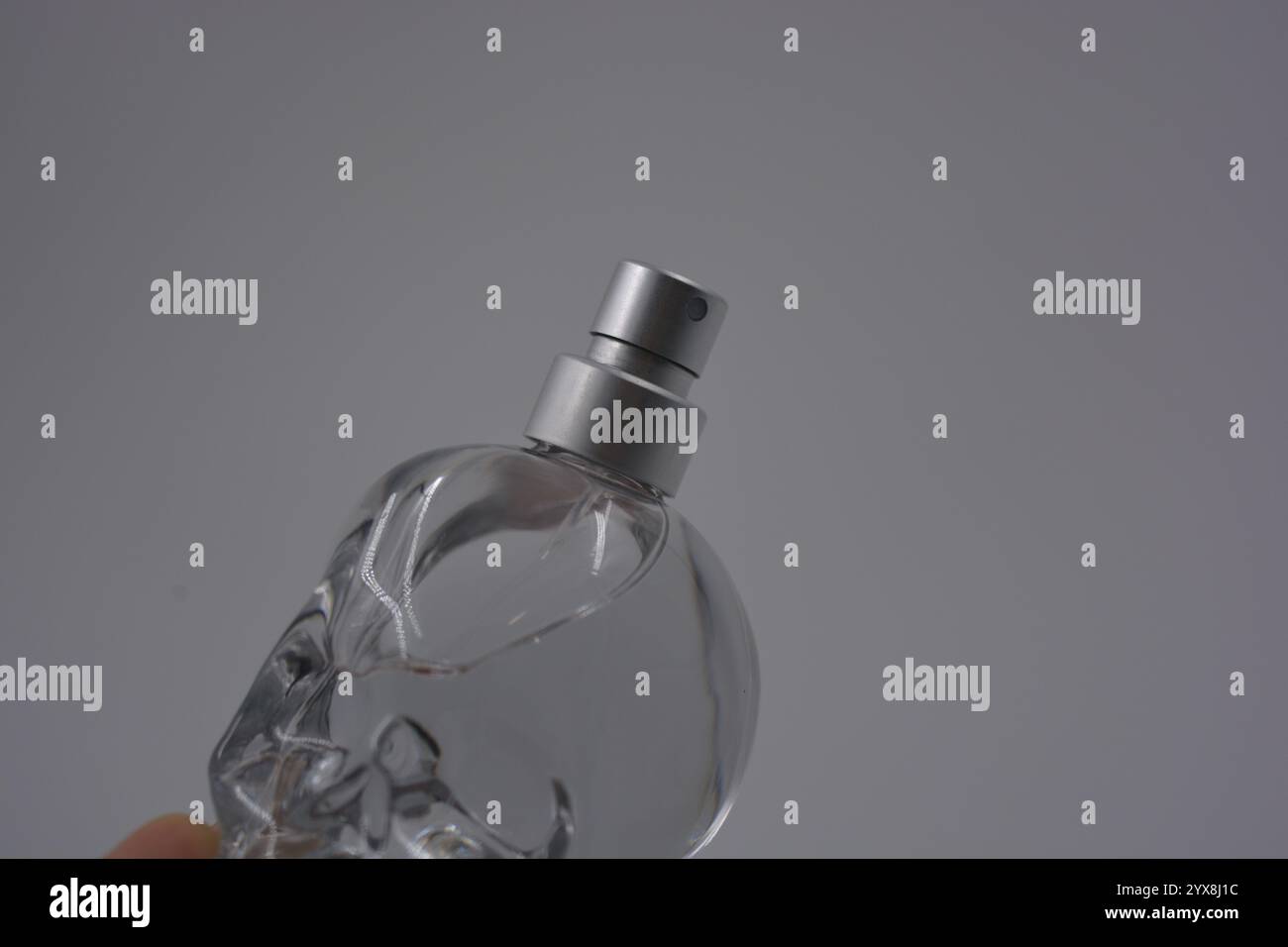 Objects, things, cosmetics and perfumes. A beautiful transparent glass ...