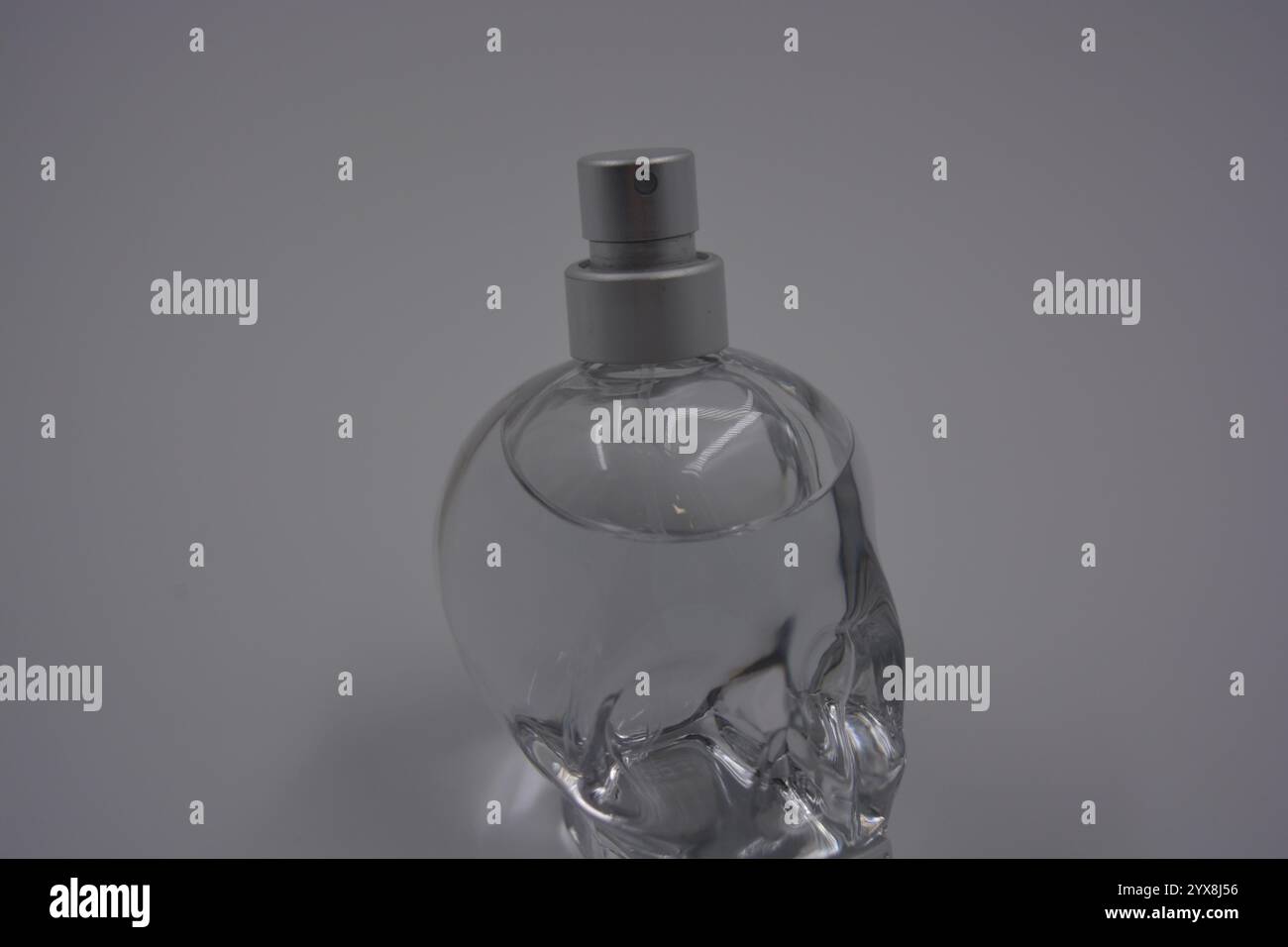 Objects, things, cosmetics and perfumes. A beautiful transparent glass ...