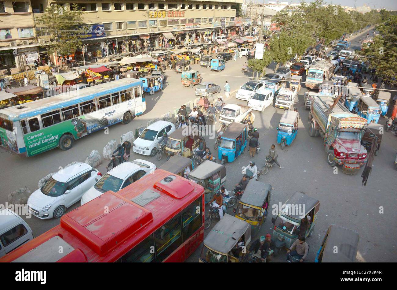 View of illegal encroachment on the road and footpath causing of ...