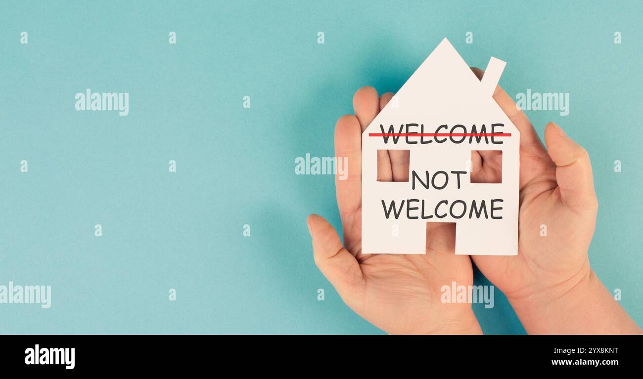 House with the phrase not welcome, discrimination in neighborhood ...