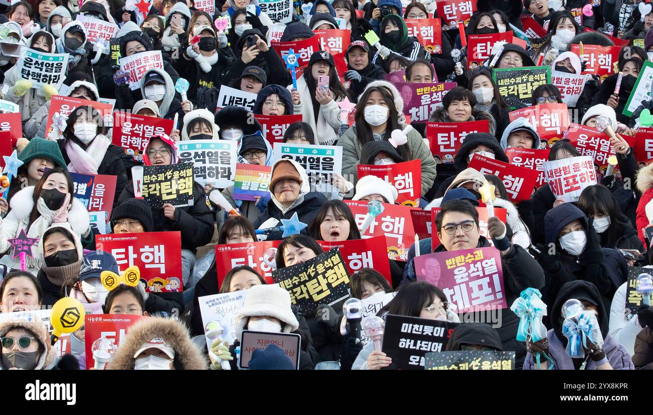 14 December 2024 – Seoul, South Korea: South Korean protesters cheer ...