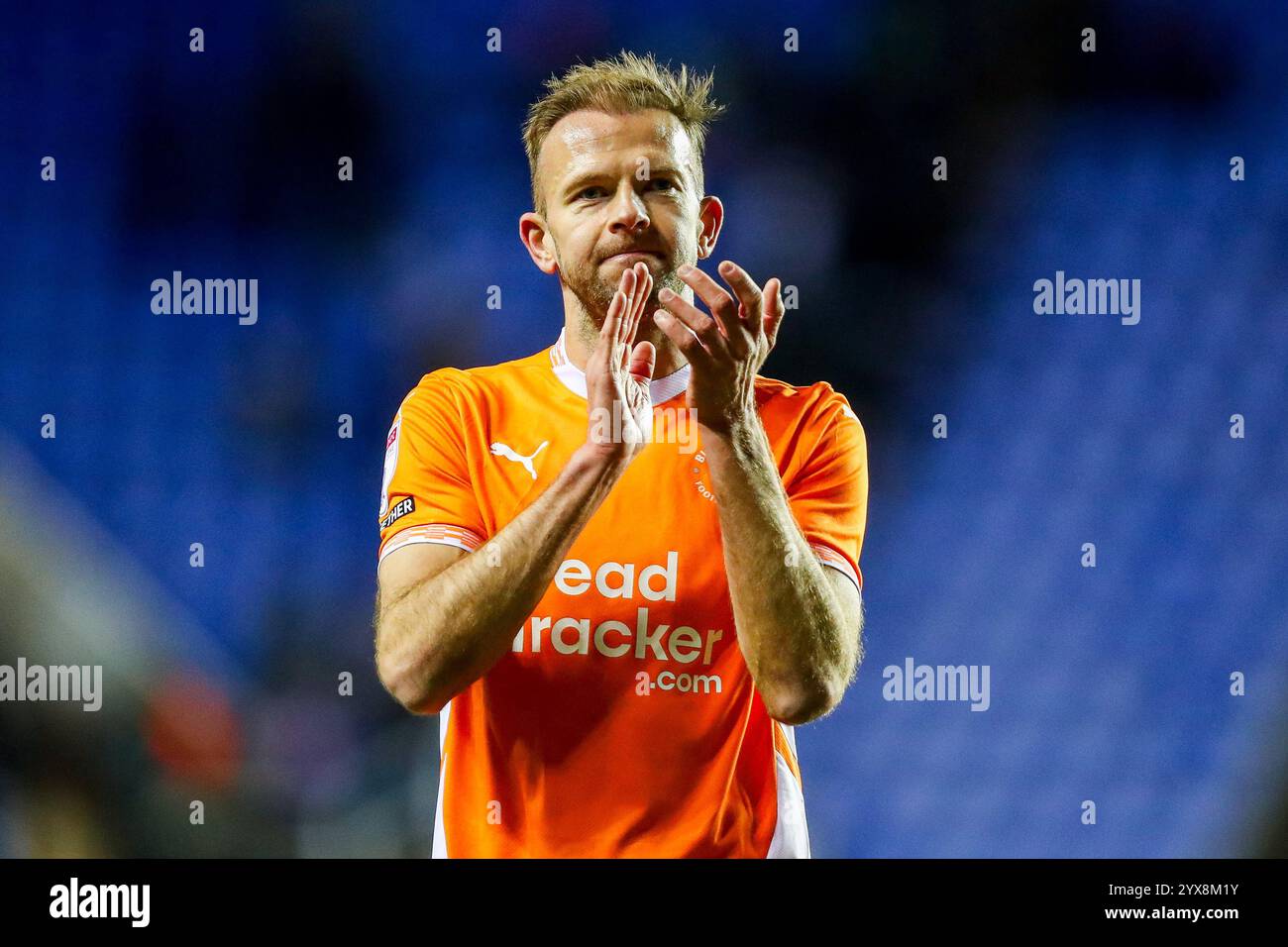 Reading, UK. 14th Dec, 2024. Jordan Rhodes of Blackpool acknowledges ...