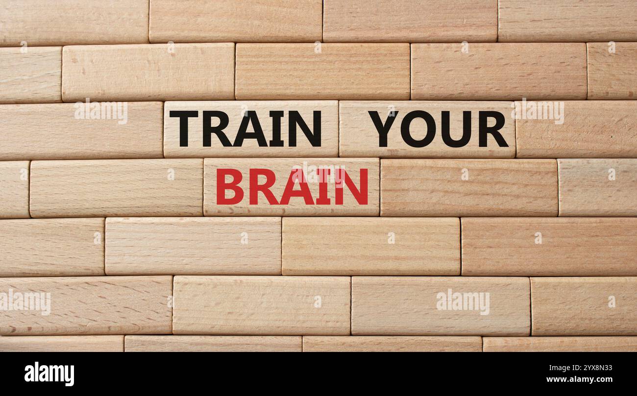 Train Your Brain symbol. Concept words Train Your Brain on wooden ...