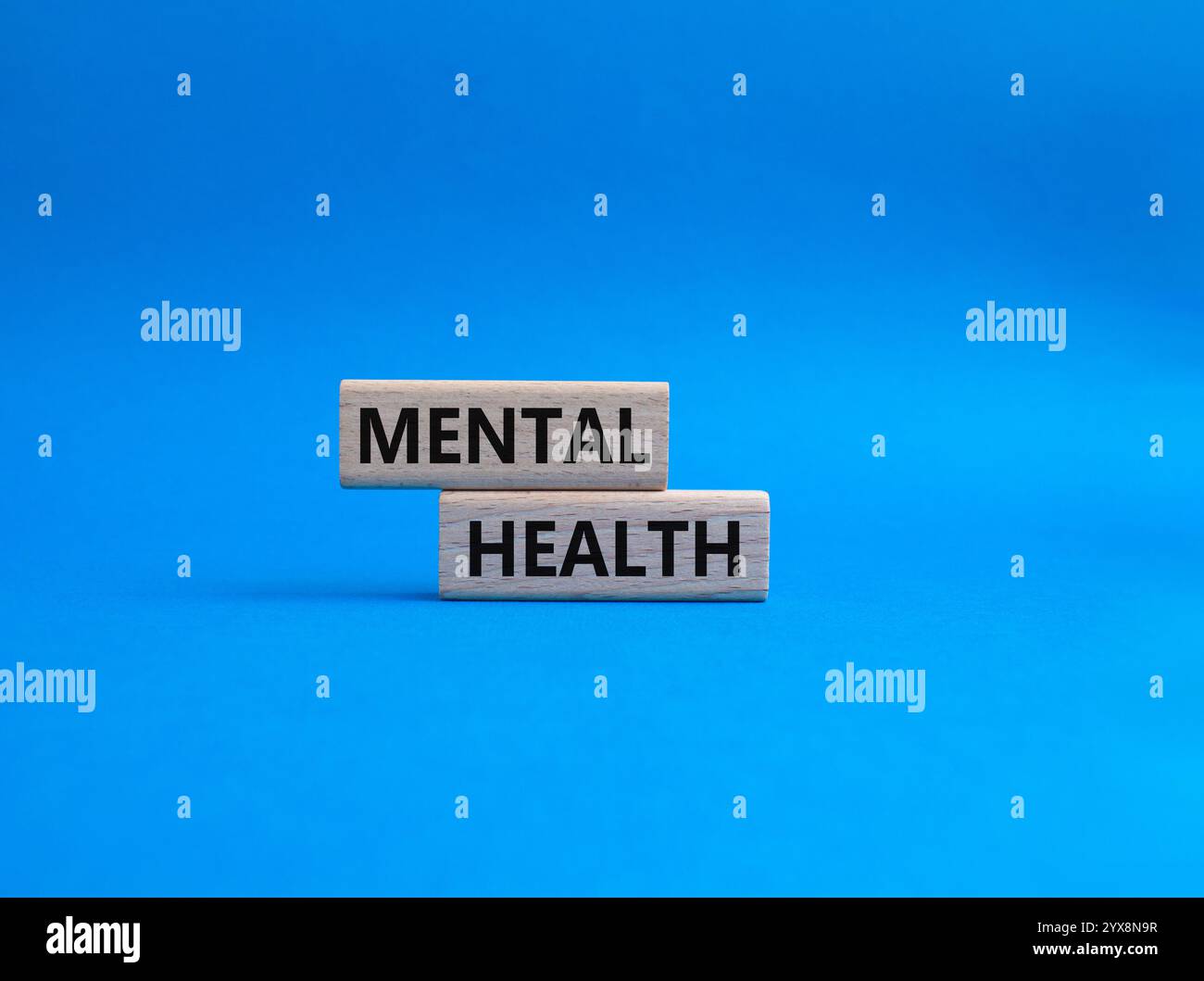 Mental Health symbol. Concept word Mental Health on wooden blocks ...