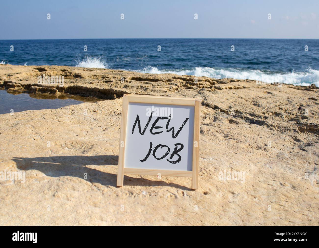New job symbol. Concept words New job on white chalk background ...