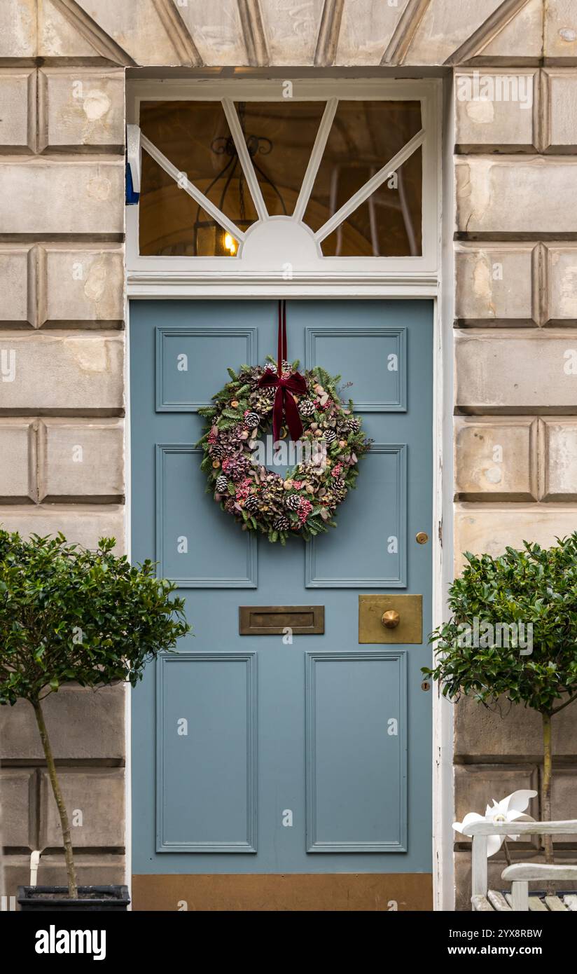 Georgian front panelled painted blue door with fanlight and Christmas ...