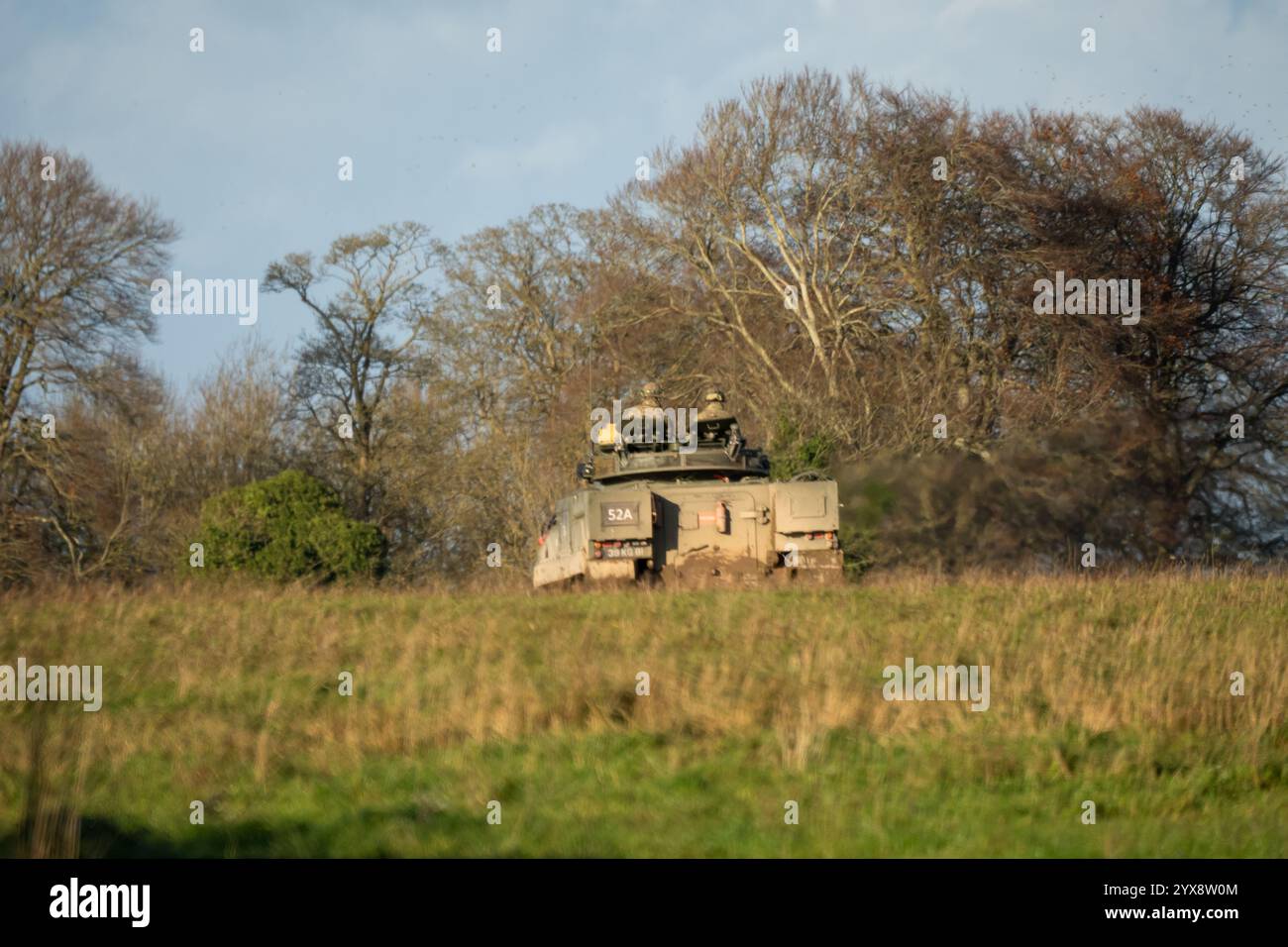 commander and gunner lookout from atop a Warrior FV510 IFV tracked gun ...
